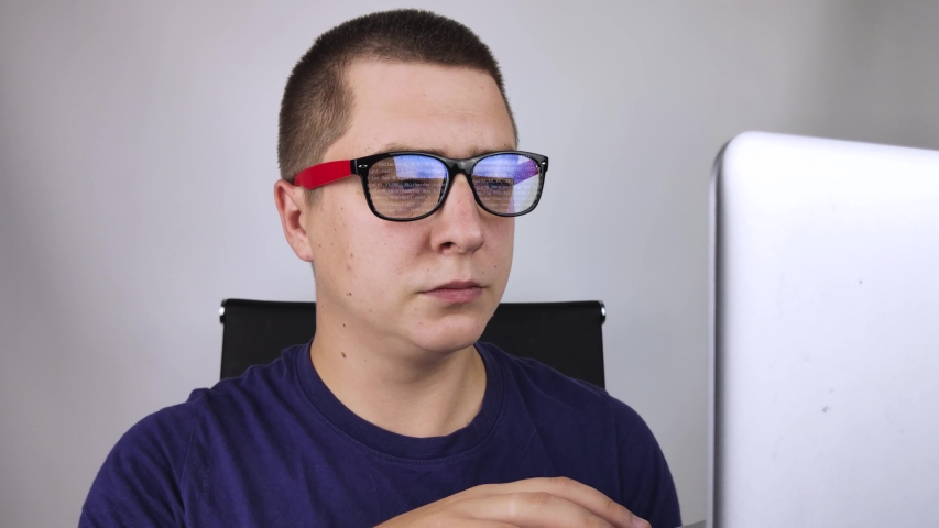 programmer's glasses reflect moving lines code Stock Footage Video (100% Royalty-free ...