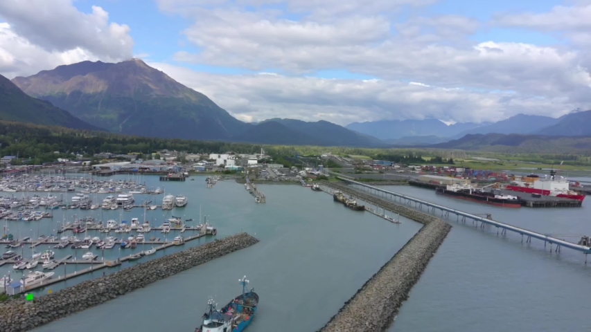 Boats in the harbor and Mountains in the Landscape in Seward, Alaska ...