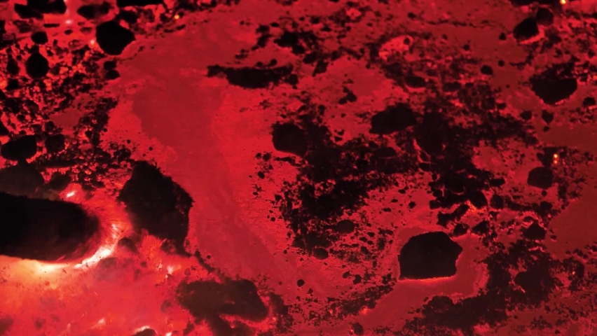 stirring liquid bright molten metal using Stock Footage Video (100% ...