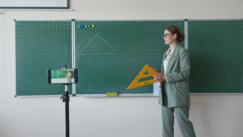 Teacher holding ruler Stock Video Footage - 4K and HD Video Clips ...