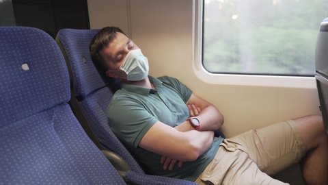 Tired Sleeping Train Commuter Wearing Ppe Stock Footage Video (100% ...