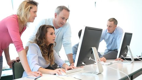Senior Team Leader Teaching New Employee Stock Photo (Edit Now) 1065757625