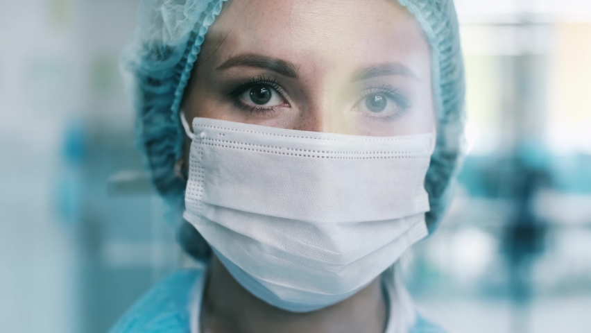 close-up face female medic looking camera Stock Footage Video (100% ...