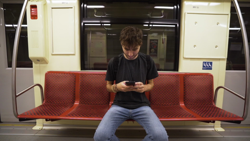Man Sitting On Subway Train Using Stock Footage Video (100% Royalty ...