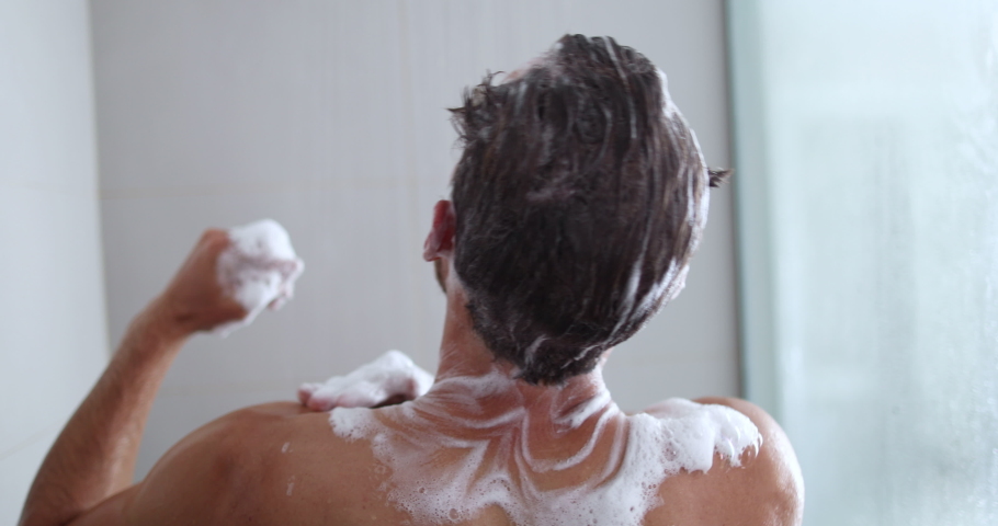 man taking shower washing back body Stock Footage Video (100% Royalty ...