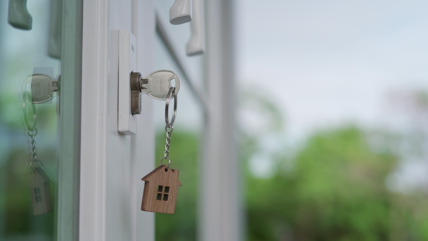 house key unlocking new plugged into Stock Footage Video (100% Royalty ...