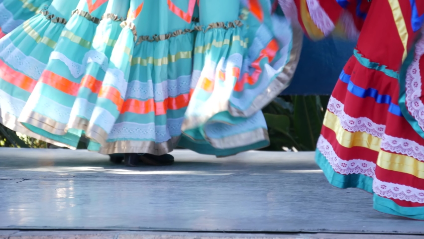 latino women colourful traditional dresses dancing Stock Footage Video (100% Royalty-free ...