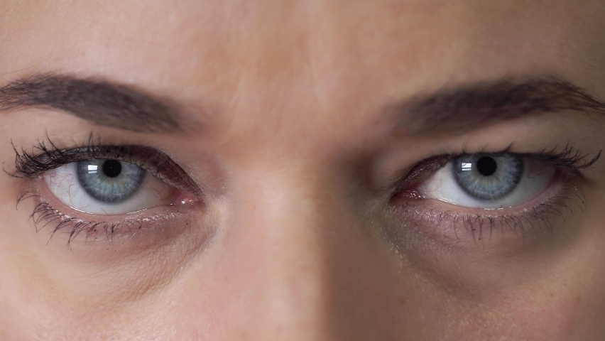 woman blue eyes watching camera blinking Stock Footage Video (100% ...
