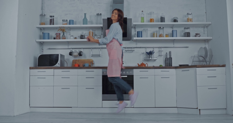 Young Woman in Apron Dancing Stock Footage Video (100% Royalty-free ...