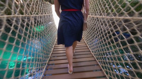 Woman Walking Over Bridge 4k Slow Stock Footage Video (100% Royalty ...