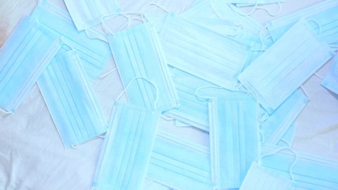Falling Disposable Masks 03 Fullhd Stock Footage Video (100% Royalty ...