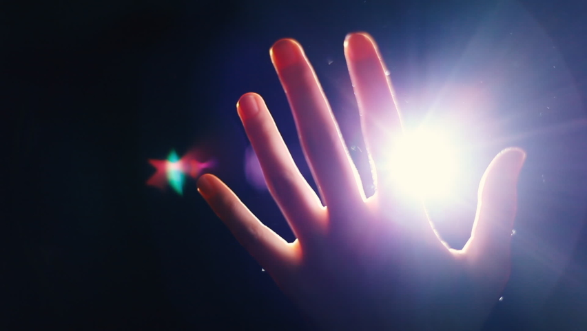 rays light through his fingers palm Stock Footage Video (100% Royalty ...