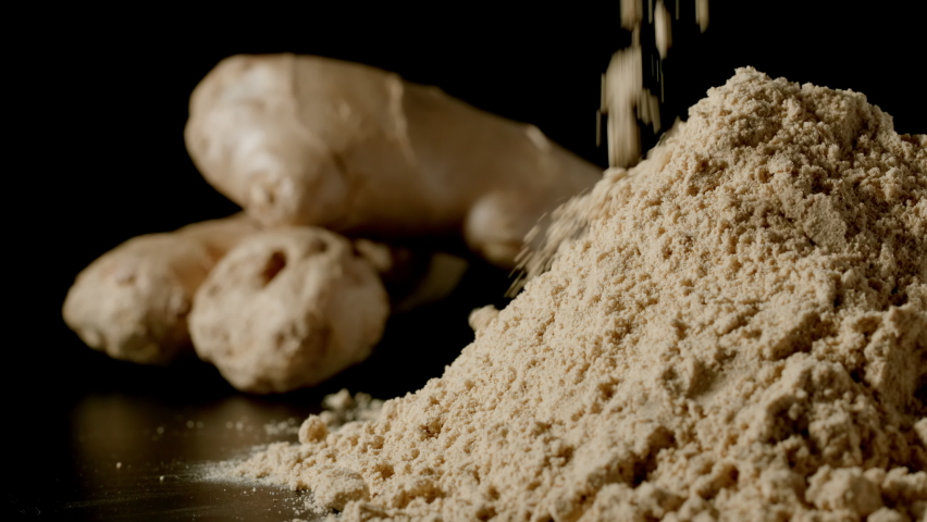 yellow ginger powder falling heap next Stock Footage Video (100% ...