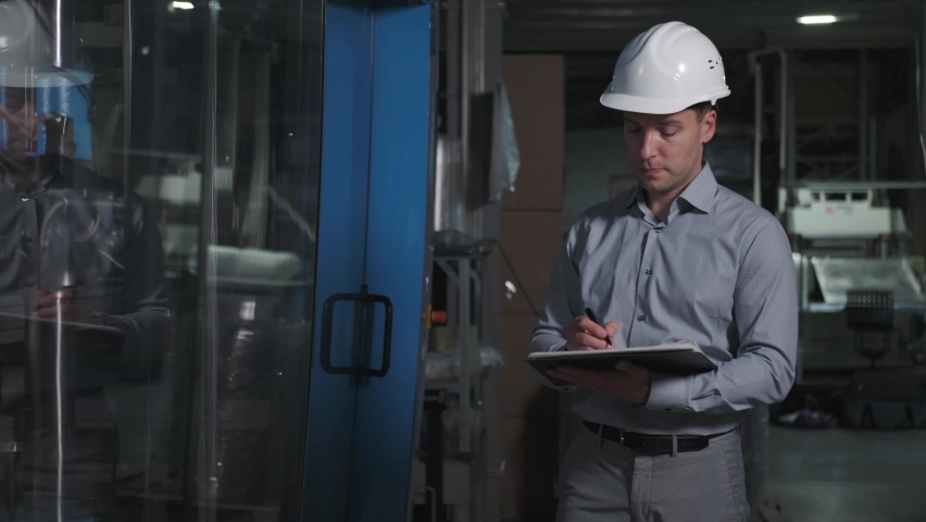businessman factory checking equipment professional man Stock Footage ...