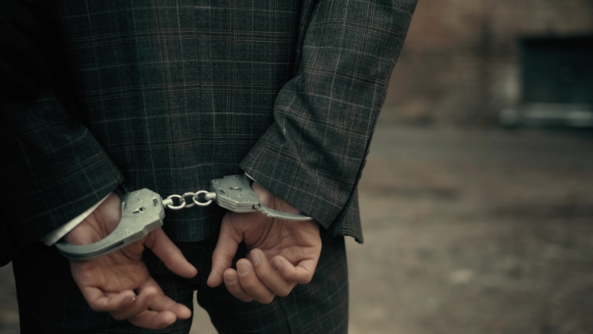 police take handcuffed prisoner prison detention Stock Footage Video ...