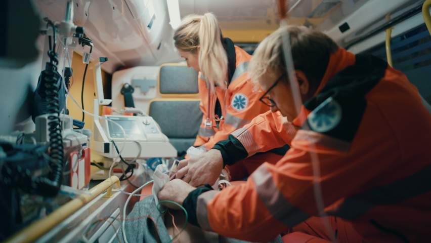 female male ems paramedics provide medical Stock Footage Video (100% ...