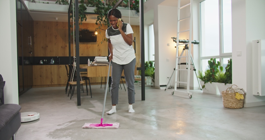 Beautiful African American Woman Mopping Stock Footage Video (100% ...