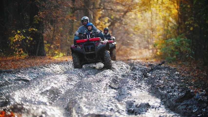outdoor family activity -people riding atvs Stock Footage Video (100% ...