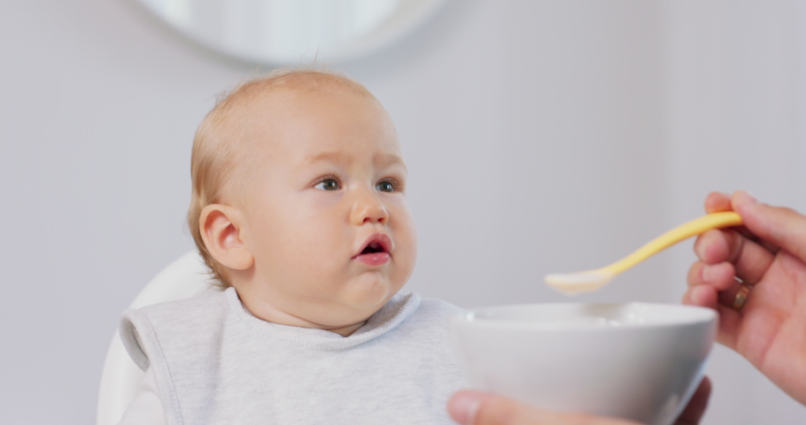 Baby Eating Sitting Happy White Background Stock Video Footage - 4K and ...