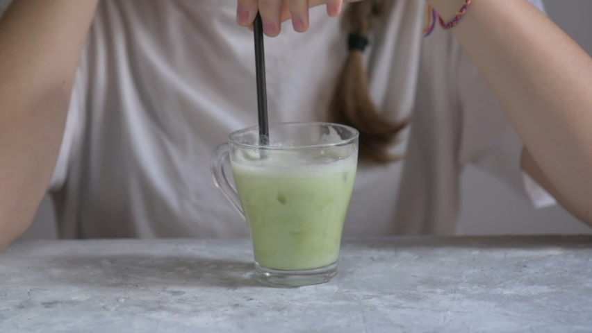 A Girl Drinking Matcha Green Stock Footage Video (100% Royalty-free ...