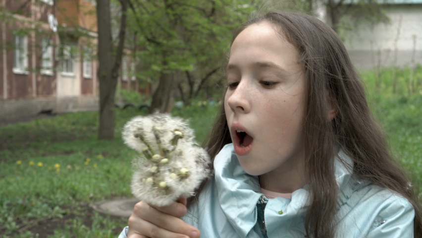 Puffs out her cheeks Stock Video Footage - 4K and HD Video Clips ...