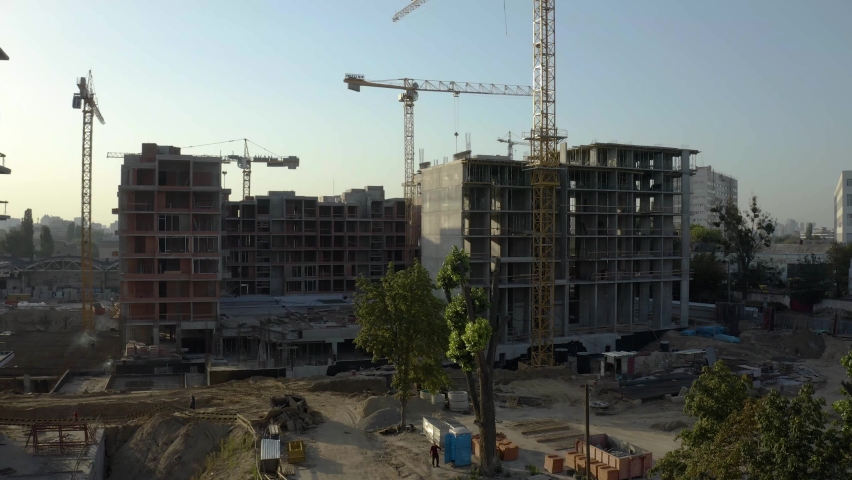 fly over construction site work personnel Stock Footage Video (100% ...