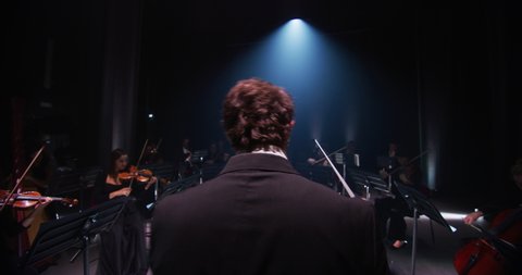 Cinematic Shot Conductor Directing Symphony Orchestra Stock Footage ...
