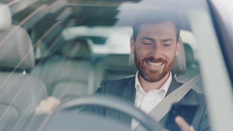 happy young smiling man driving car Stock Footage Video (100% Royalty ...