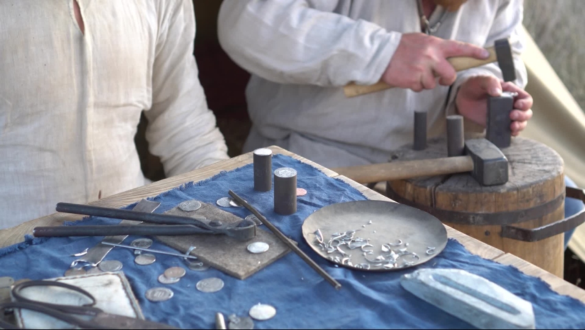 moneyer mints money ancient coin dies Stock Footage Video (100% Royalty ...