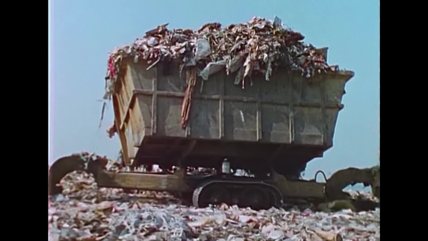 circa 1970s - garbage trucks move Stock Footage Video (100% Royalty ...