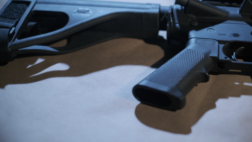 slide across ar-15 assault rifle starting Stock Footage Video (100% ...