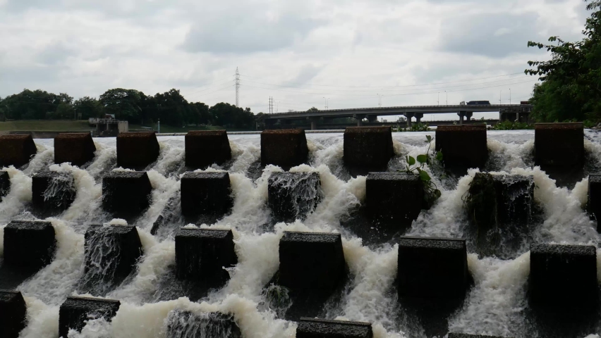 weir overflowing water rainy season Stock Footage Video (100% Royalty ...