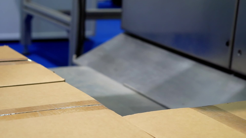 mechanical manipulator stacks cardboard boxes operation Stock Footage ...