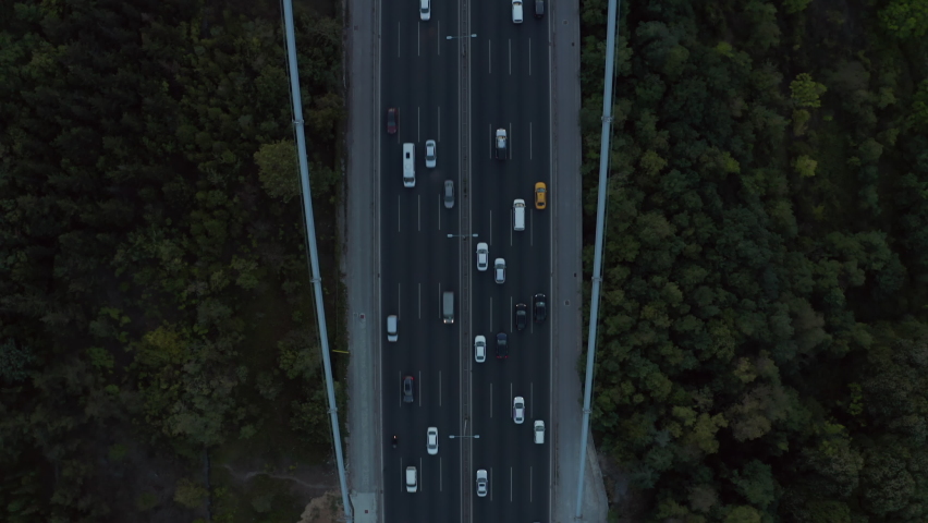 cars driving onto bridge towards city Stock Footage Video (100% Royalty ...