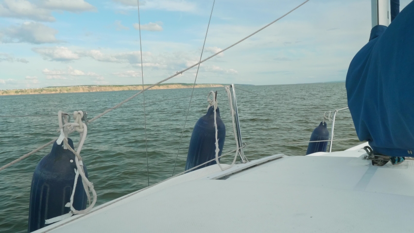blue fenders hangnig yacht pulpit sailing Stock Footage Video (100% ...