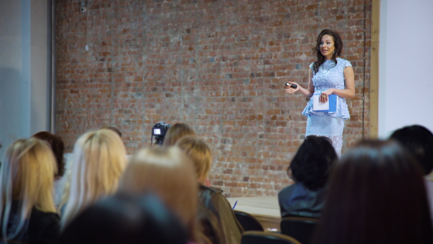 female speaker business conference giving public Stock Footage Video ...