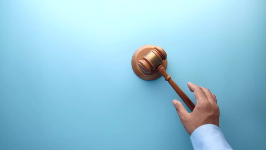 top view person's hand striking gavel Stock Footage Video (100% Royalty ...