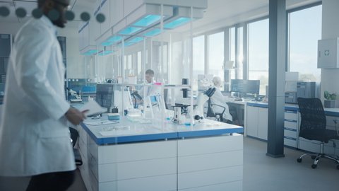 medical science laboratory diverse multi-ethnic team Stock Footage ...