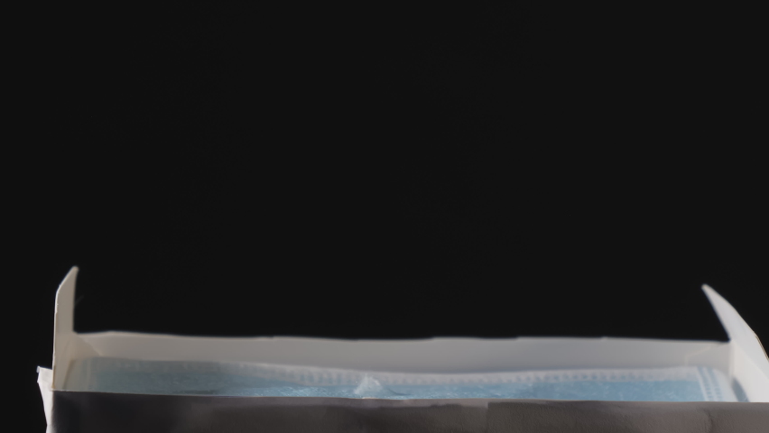 pulling off center face mask hole Stock Footage Video (100% Royalty ...