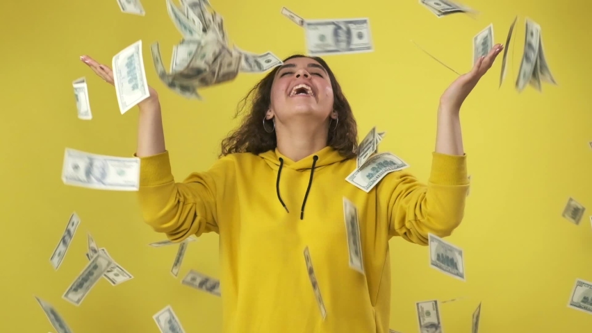 successful woman standing under money shower Stock Footage Video (100% ...