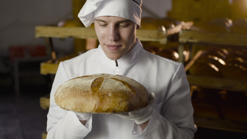 Man Holding A Loaf Of Bread Stock Video Footage - 4K and HD Video Clips ...
