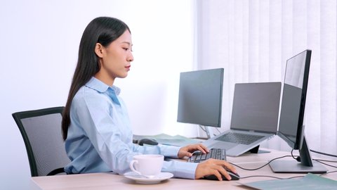 Asian Woman Programmer Typing Source Code Stock Footage Video (100% Royalty-free) 1063613995 ...