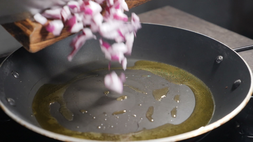 frying chopped onion pan slow motion Stock Footage Video (100% Royalty ...