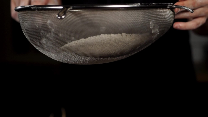 close-up particles white flour falling through Stock Footage Video (100 ...