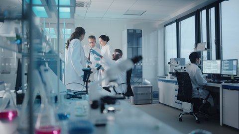 medical science laboratory diverse multi-ethnic team Stock Footage ...