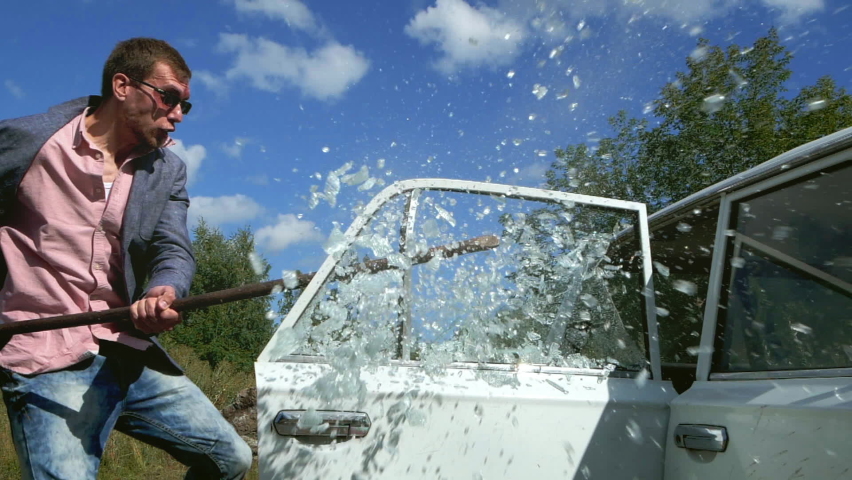 mad man aggress destroy car crowbar Stock Footage Video (100% Royalty ...