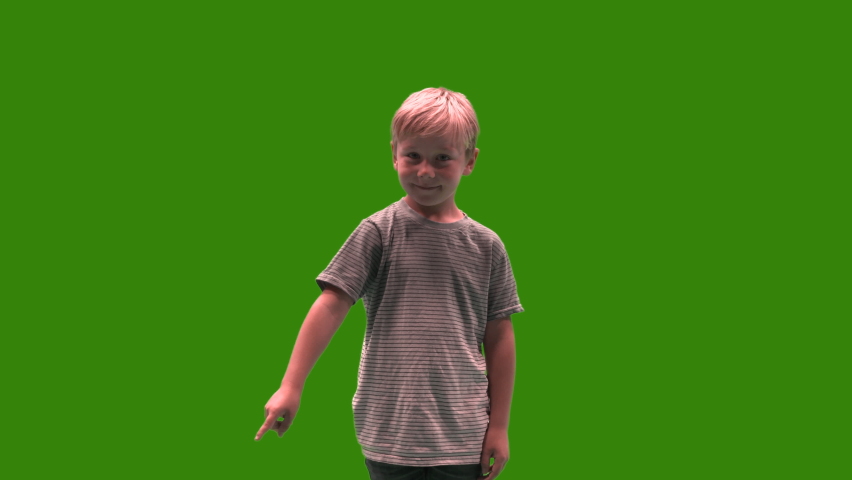 young boy on green screen pointing Stock Footage Video (100% Royalty ...