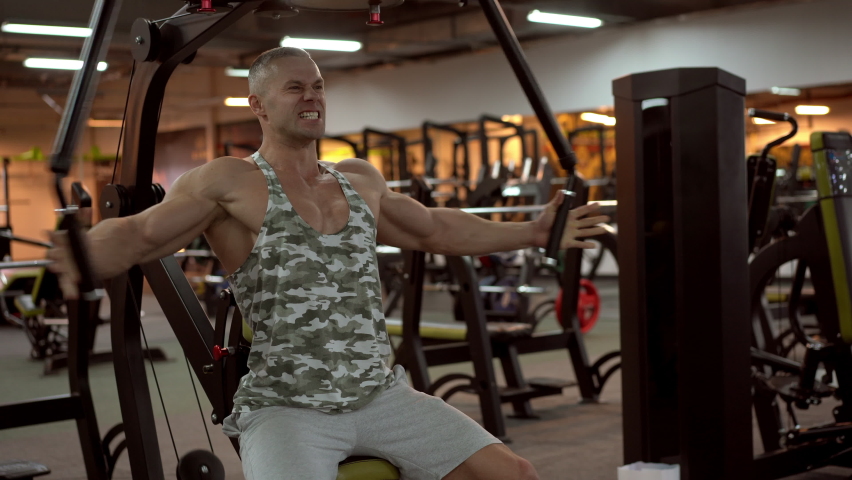 Muscular Athletic Bodybuilder Sitting Bench Training Stock Footage ...