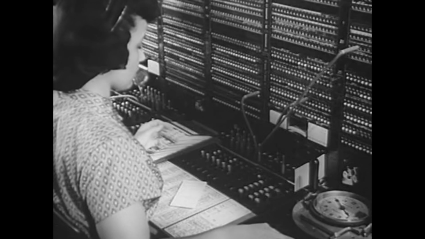 circa 1950s - telephone operator demonstrates Stock Footage Video (100% ...