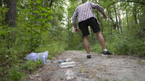 Young Man Throwing Litter Garbage Plastic Stock Footage Video (100% ...